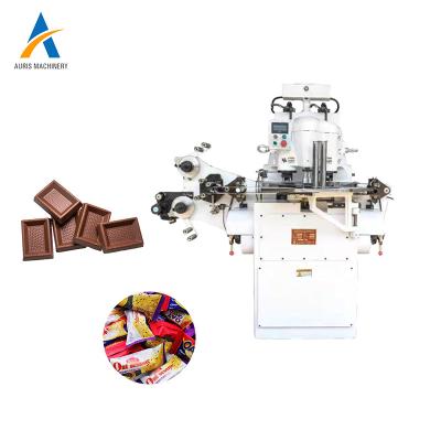 Cina Macchina di fabbricazione di cioccolato della macchina avvolgitrice del cioccolato della moneta di oro macchina imballatrice completamente automatica di alta efficienza in vendita