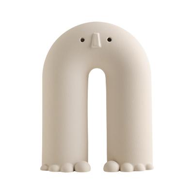 China Sculptural Ceramic Face Vase for Minimalist Interiors for sale