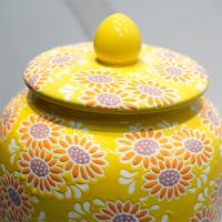 China Yellow Ceramic Ashes Urn with Decorative Flower Artwork for sale