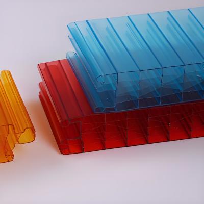 China 40mm Red Polycarbonate Sheet Durable Impact-Resistant And Aesthetically Appealing With Plug-Pattern Texture And UV Protection for sale