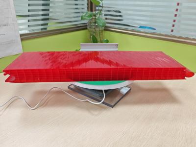 China 40mm Red Polycarbonate Sheet Durable Impact-Resistant And Aesthetically Appealing With Plug-Pattern Texture And UV Protection for sale