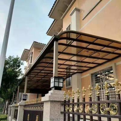 China Aluminum Frame Polycarbonate Canopy Featuring PC Coated Sail Finishing Ideal for Outdoor Commercial Vehicle Parking and Storage Needs for sale