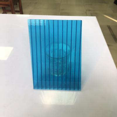 China Length 2.44m 5.8m 11.9m Customized Plastic Polycarbonate hollow Sheet Easy To Install Blue Lightweight Weather Resistant Clear for sale