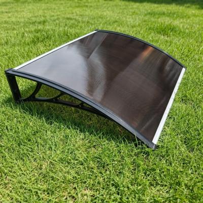 China Brown Window Polycarbonate awning featuring plastic or aluminum bracket designed to provide long lasting protection and enhanced aesthetic appeal for sale