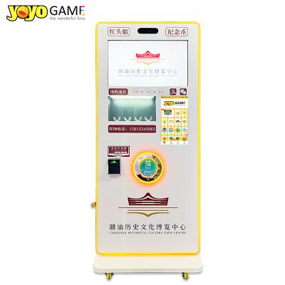 China 32 Inch Touchscreen Medal Vending Machine with 300-600 pcs Capacity and 1 Year Warranty for Souvenir Coins for sale