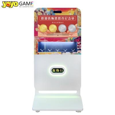 China 32 Inch Touch Screen Medal Vending Machine with 300-600 pcs Capacity and AC 110-240V Voltage for Souvenir Coins for sale