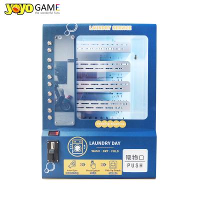 China Wall mounted vending machine featuring coin operated payment and spring rotation drop for smooth and jam free dispensing for sale