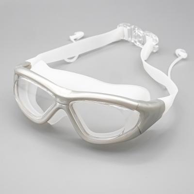 China Anti-Fog UV Protection No Leaking Swimming Goggles with Comfortable Silicone Frame and Ear Plugs for sale