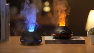 China Hot Sell Diffuser Fragrance Oil USB Air Perfume Humidifier Aroma Diffuser Essential Oil Diffuser With 7 Colorful Lights For Home for sale
