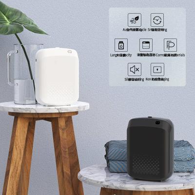 Cina Nuovo design all'ingrosso diffusore di profumo elettrico portatile montato a parete diffusore di profumo per olio essenziale diffusore di profumo per denti blu in vendita