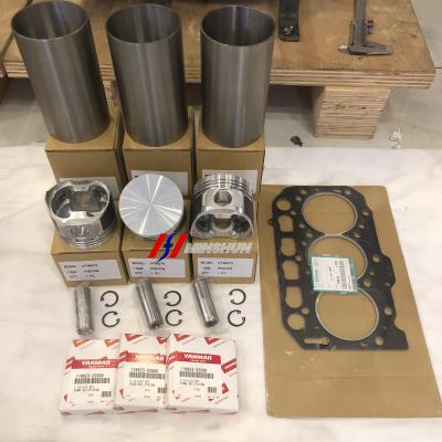 China Kit de revestimiento del cilindro + junta de cabeza para el motor 3D74E Partes de repuesto de alta calidad en venta