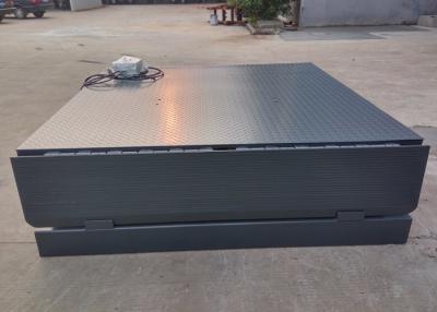 China 8000KG Capacity 700MM Adjusted Height Grey Color Hydraulic Dock Leveler For Forklift factory