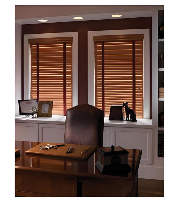 Custom cordless window shades in bedroom setting