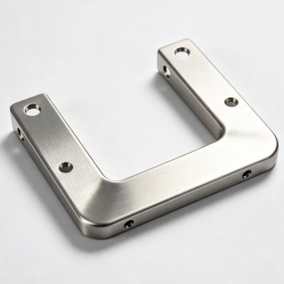 China CNC Stamped SS 304 Shelf Bracket with Controlled Bend Radius and Precision Hole Pattern for Industrial Use for sale