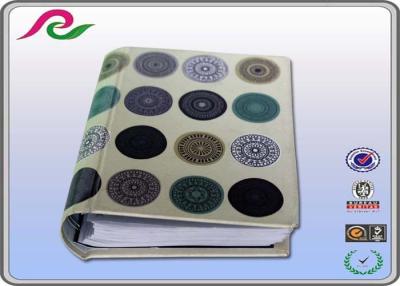 China Green printing marked notepad hardcover sparil bound notebooks for sale