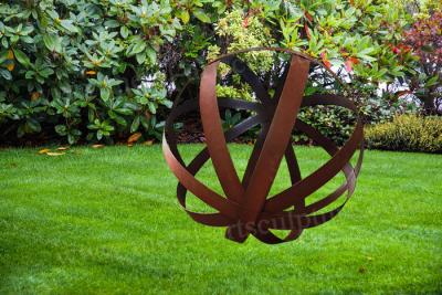 China Hollowed Out Football Shape Corten Steel Sculpture As Front Yard Ornament for sale