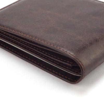 Cina titolare della carta del cuoio di Saffiano del polisacco di 11.5X9.5cm, portafoglio esile del titolare della carta di credito ISO9001 in vendita