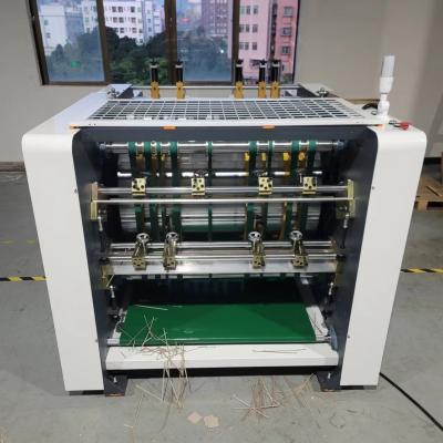 China DG-1200G Paperboard Automatic Grooving Machine Cardboard V Grooving Machine for sale
