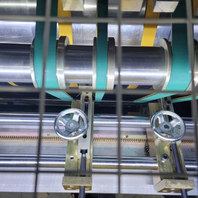 China DG-1200G Paperboard Automatic Grooving Machine Cardboard V Grooving Machine for sale