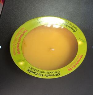 China Yellow Citronella tin scented candle with the printed label shrinked for sale
