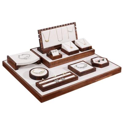 China Customized Walnut Jewelry Display Stand with High-Quality Wood Construction and Professional 3D Shop Design for sale