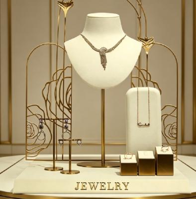 China Premium Brushed Champagne Gold Metal Frame Jewelry Display Stand with Ultra-Soft High-Density Beige Velvet Lining and Ergonomic Bust & Stand Design for sale