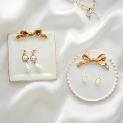 China Gold Plated Metal Jewelry Display Stand Luxury Props for Diamond Gemstone Jewelry for sale