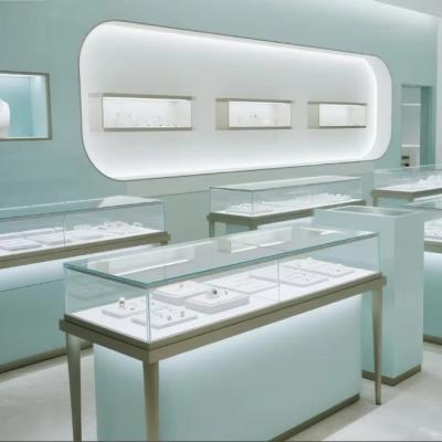 China Slim Profile Jewelry Display Case with Stainless Steel Frame and Customizable Design for Small Shops for sale