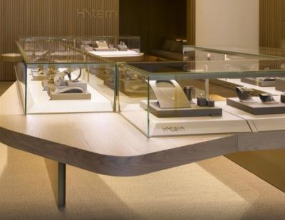 China Modern Luxury LED Lighting Jewelry Showcase with Customizable Solutions and Durable Easy Clean Island Display Cabinet for sale
