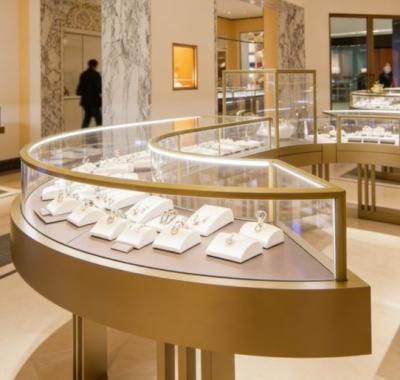 China Luxury S-Shaped Curved Jewelry Display Cabinet with LED Lighting and Natural Marble Accents for sale