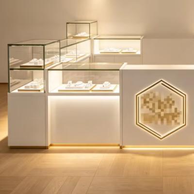 China Custom Luxury Perfume Display Cabinet with LED Lighting and Durable Construction for Boutique Shops for sale