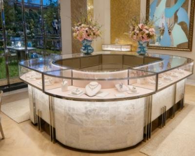 China LED Lit Jewelry Display Pedestal with Brushed Gold Metal Frame and Glass Enclosure for Luxury Watch Showcase for sale
