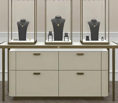 China Elegant Gold/Stainless Steel Jewelry Display Table with Glass Top and LED Lighting for Luxury Retail and Mall for sale