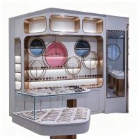 China Wall Mounted Display Case with Built-in High CRI LED Lighting Adjustable Glass Shelves and Solid Back Construction for sale
