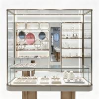 China Wall Mounted Display Case with Built-in High CRI LED Lighting Adjustable Glass Shelves and Solid Back Construction for sale