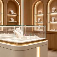 China Secure Jewelry Display Table with 12 Compartments and Dimmable LED Lighting for sale