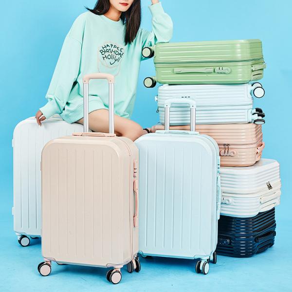 Quality 777 candy colored suitcase with swivel wheels, lightweight pink boarding case, for sale