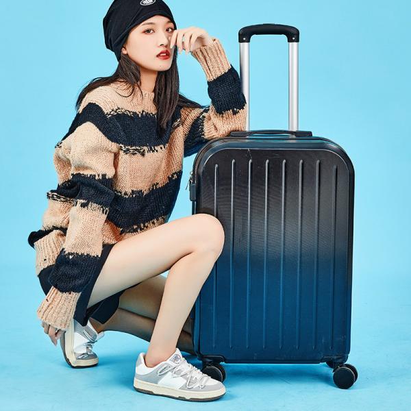 Quality 777 candy colored suitcase with swivel wheels, lightweight pink boarding case, for sale