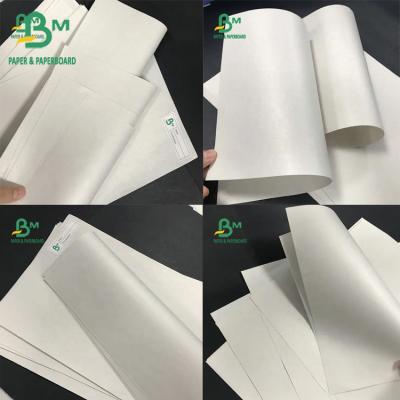 Cina 42gsm 45gsm Greyish White Plotter Paper Roll For Clothes 62" 65" 67" 72" 75" Uncoted Paper Samll Reel in vendita