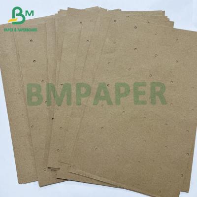 China 70gsm Recyclable Round Hole Perforating Underlay Kraft Paper For Garment Factory for sale