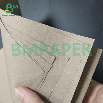 China 60gsm No Paper Dust Brown Bobbin Fibre Core Kraft Paper For Tape Pipe for sale