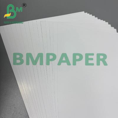China 150gsm High Glossy C2s Art Paper White Silk Shining Board For Covers for sale