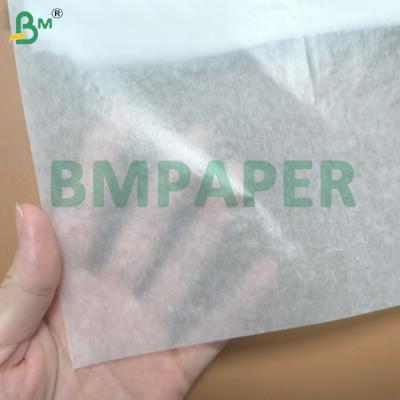 China Food Packing White Double Sided Waxed Candy Wrapping Paper 30gsm - 40gsm for sale