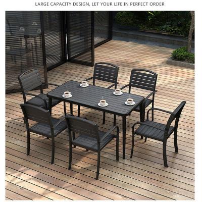 China Tabela e cadeira de jantar de madeira para jardim de estilo moderno à venda