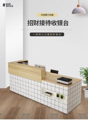Cina Appartamento per ufficio Salone di arredamento Recepzione con banco di pagamento rapido e pannello in legno in vendita