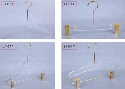 Cina Boutique Plastic Hanger OEM Brand Fashion Adult Coat Garment Display Plastic Gold Hangers in vendita