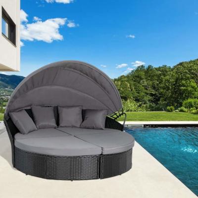 Cina Modern Hotel Outdoor Furniture Patio Rattan Round Flip Top Daybed With Canopy Cushion For Backyard Porch in vendita