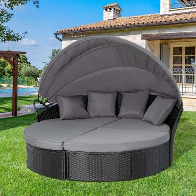 Cina Modern Hotel Outdoor Furniture Patio Rattan Round Flip Top Daybed With Canopy Cushion For Backyard Porch in vendita