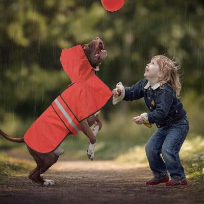 Cina Reflective Dog Raincoat - Adjustable Waterproof Raincoat for Dogs, Lightweight Dog Hooded Slicker Rain Coat Poncho in vendita