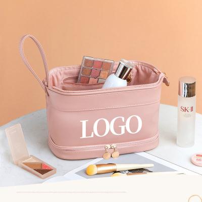 Cina Customized New Arrival Luxury Portable Pu Large White Leather Travel Toiletry Storage Makeup Cosmetic Bags With Logo in vendita